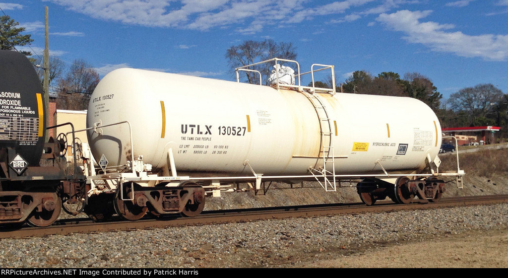 UTLX 130527 hydrochloric acid tank car westbound on NS at Church Street in Mableton Ga 12-26-2014
